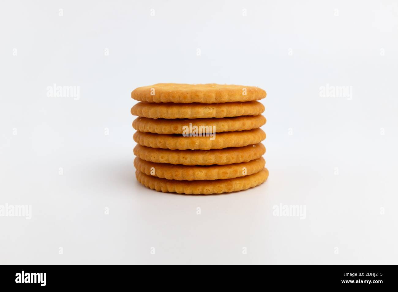 Round and yellow biscuits with background Stock Photo - Alamy