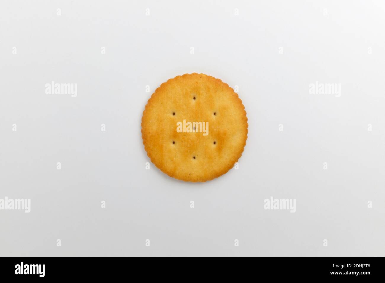 Round and yellow biscuits with background Stock Photo - Alamy
