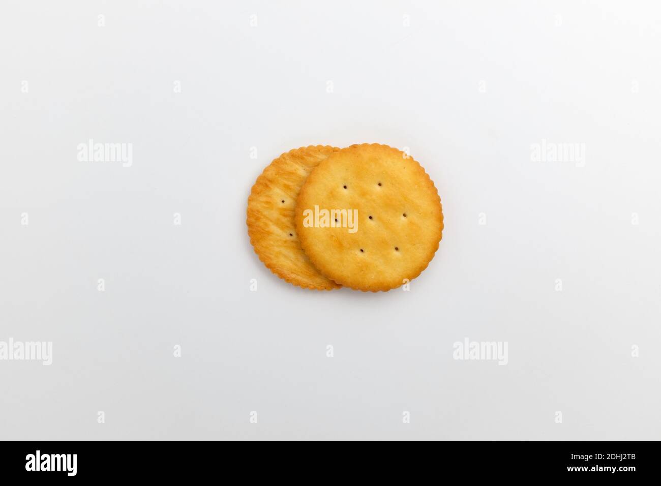 Round and yellow biscuits with background Stock Photo - Alamy