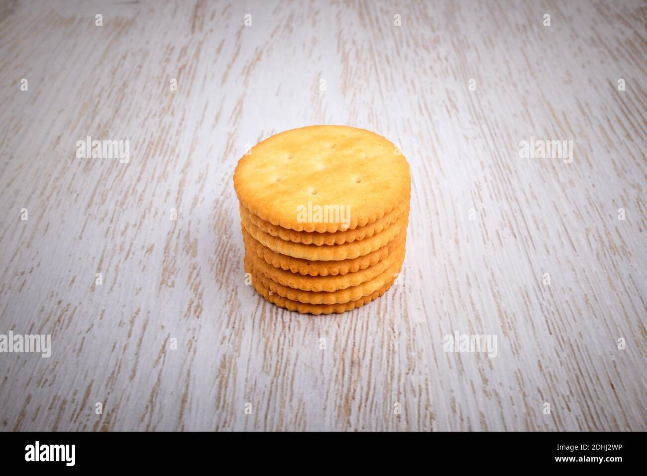 Round and yellow biscuits with background Stock Photo - Alamy