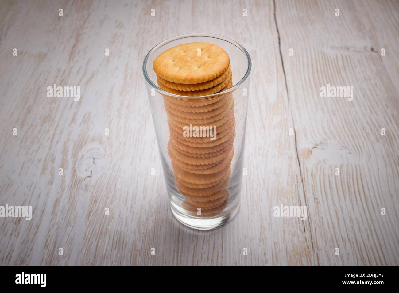 Round and yellow biscuits with background Stock Photo - Alamy