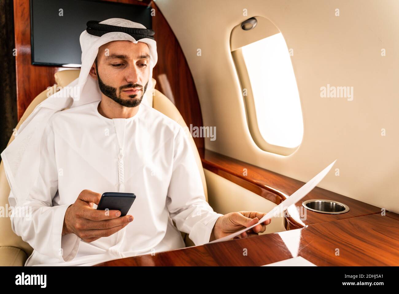 Arabic man wearing kandora in emirates style flying on exclusive ...