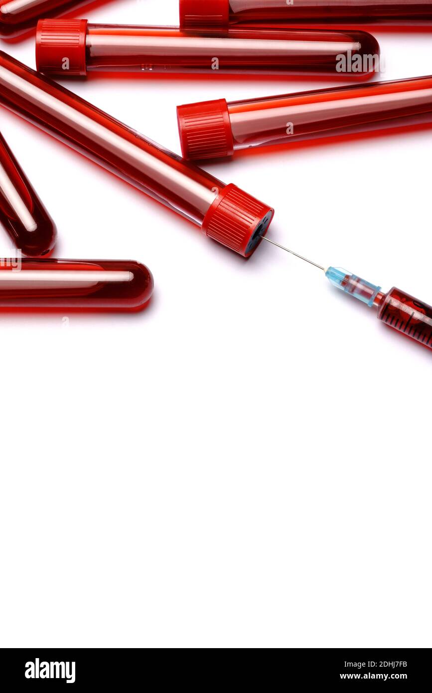 Medical syringe and plastic test tube isolated on white background ...