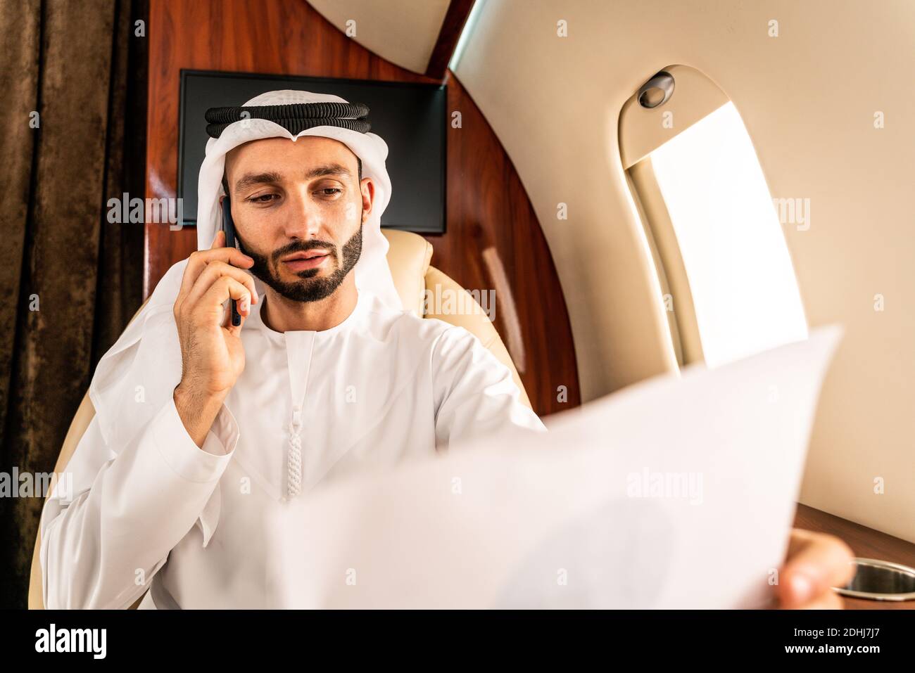 Arabic man wearing kandora in emirates style flying on exclusive ...