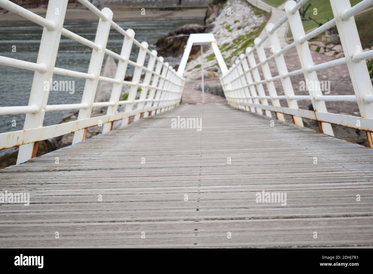 A closeup shot of a wooden bridge on the beach Stock Photo - Alamy