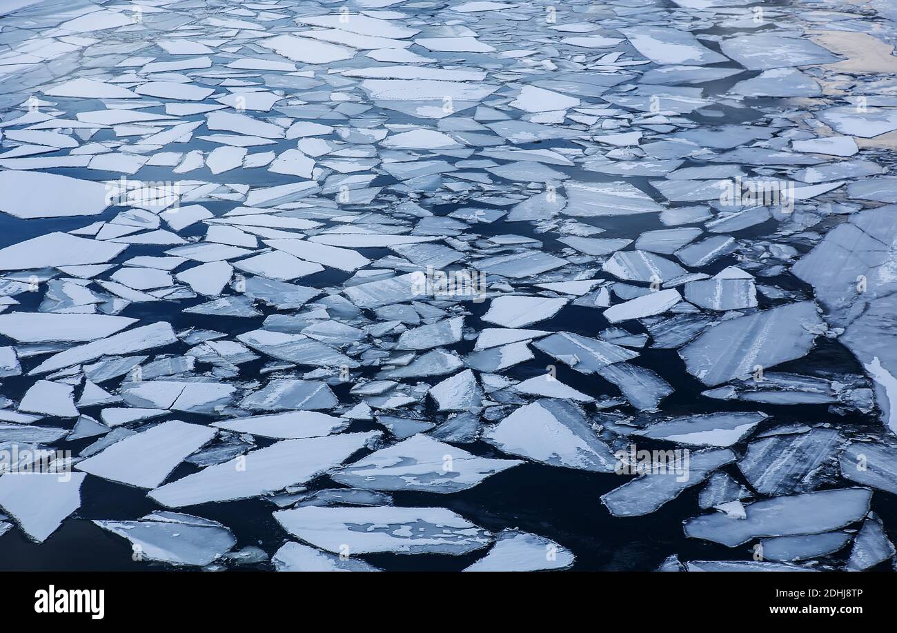 split ice on the water surface in early spring Stock Photo - Alamy