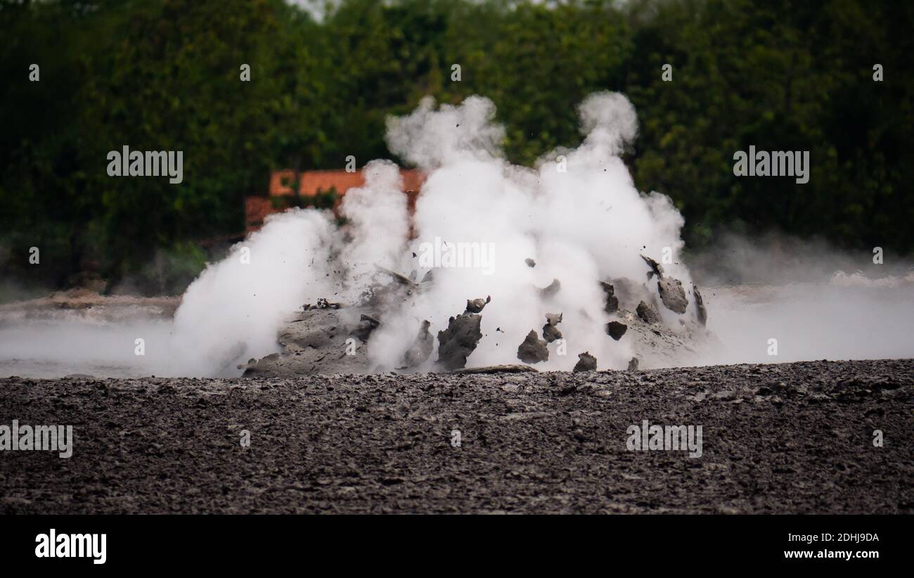 mud volcano with bursting bubble bledug kuwu. volcanic plateau with ...