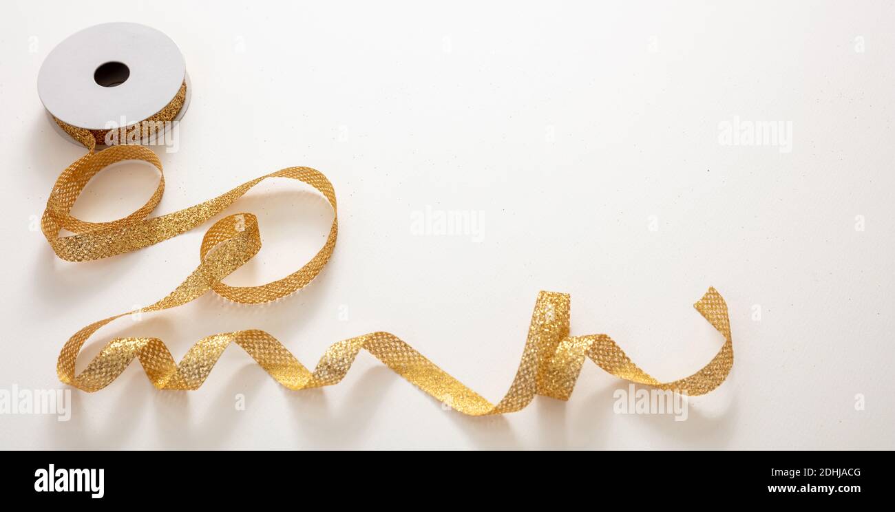 Christmas presents homemade packaging, holiday preparation. Shiny gold ...