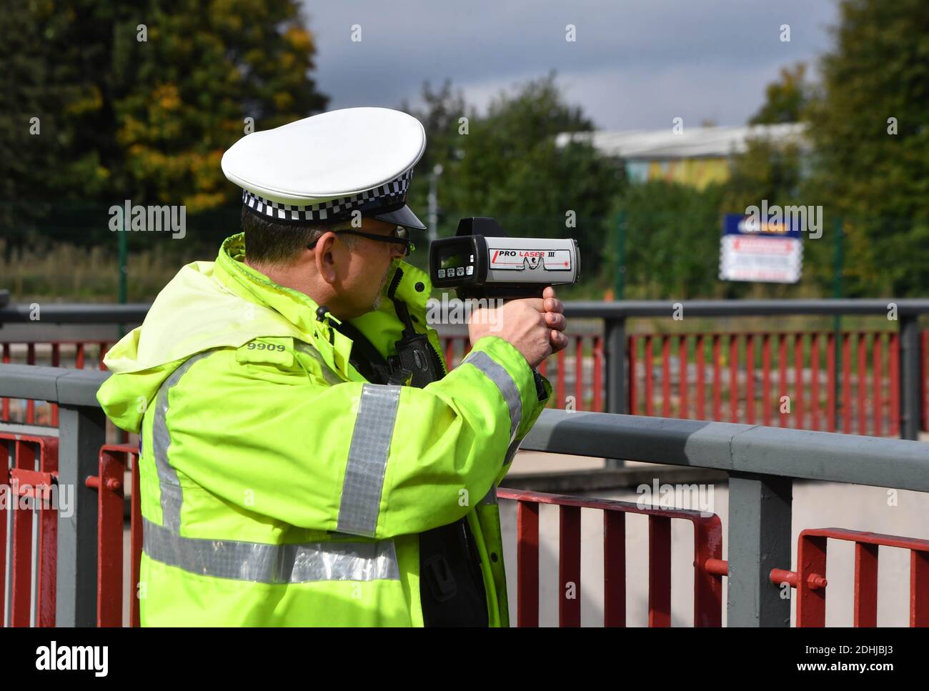 Police traffic officer holding speed checks over the A34 underpass as ...