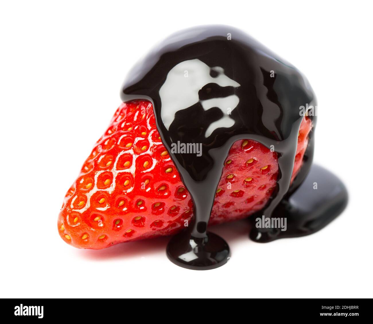 single strawberry with chocolate coating Stock Photo - Alamy