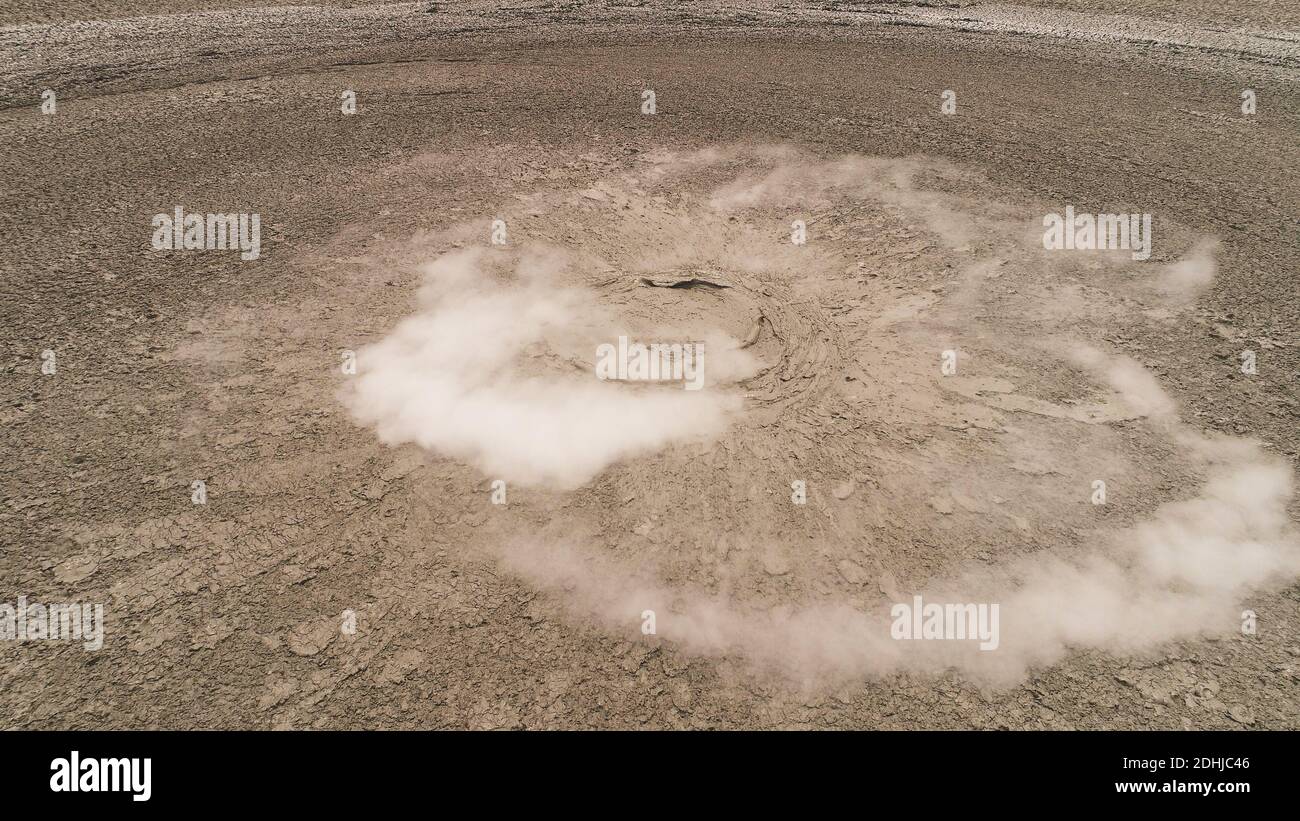 Mud volcano with bursting bubble bledug kuwu. aerial view volcanic ...