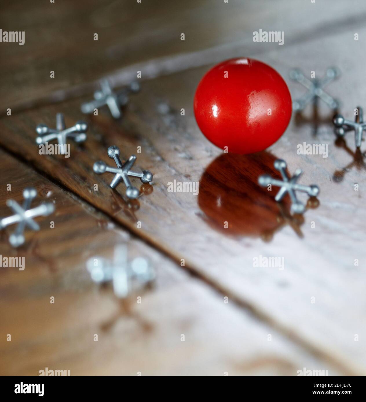 Red ball and jacks hi-res stock photography and images - Alamy