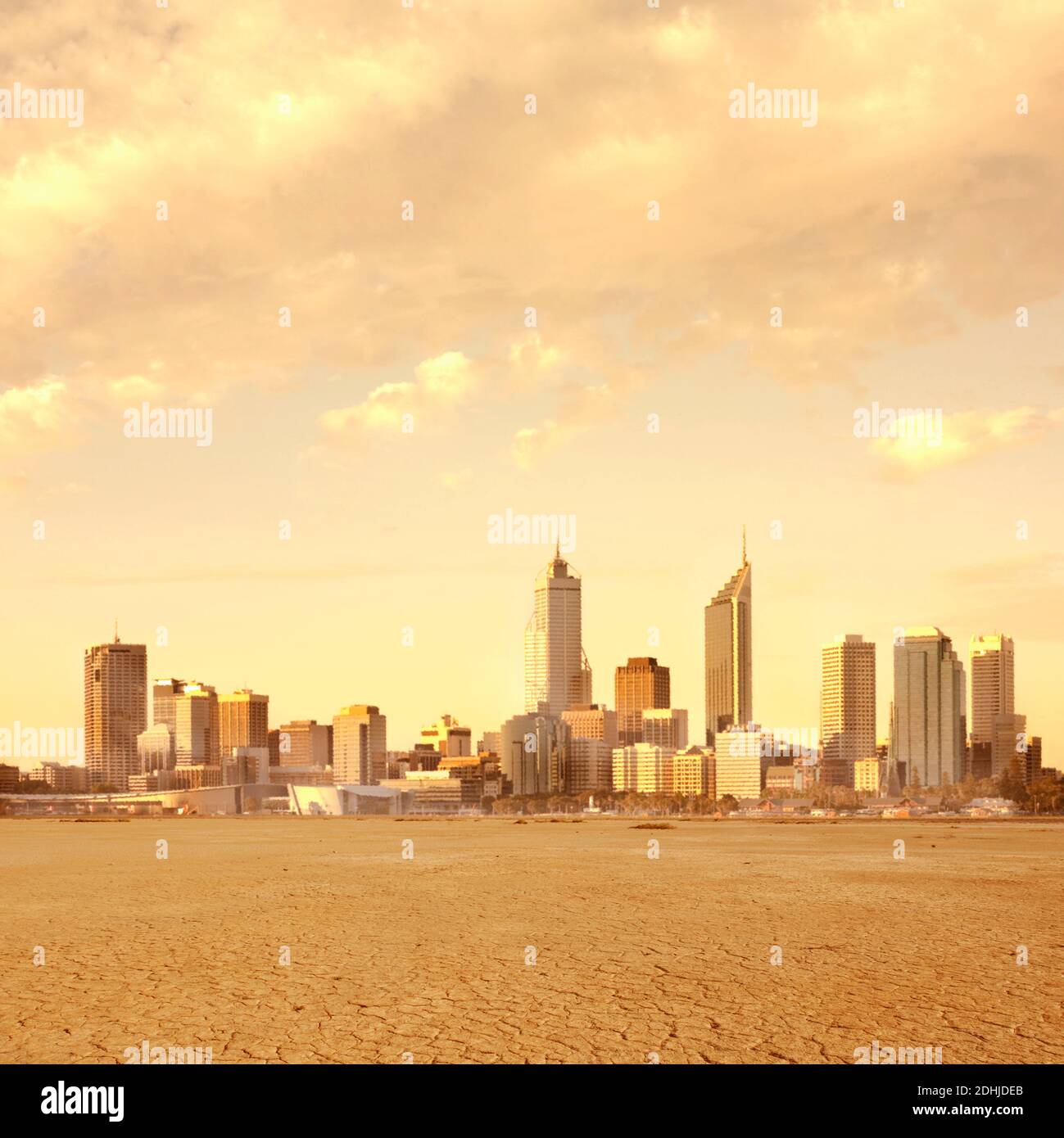 Skyscrapers with arid earth in foreground Stock Photo - Alamy