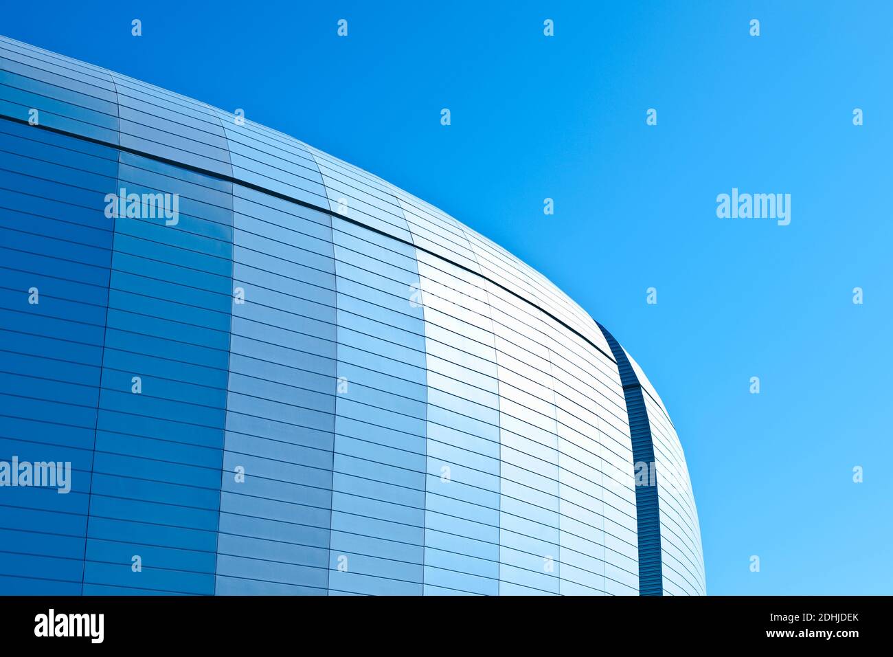 Curved roof of a metal modern building Stock Photo - Alamy