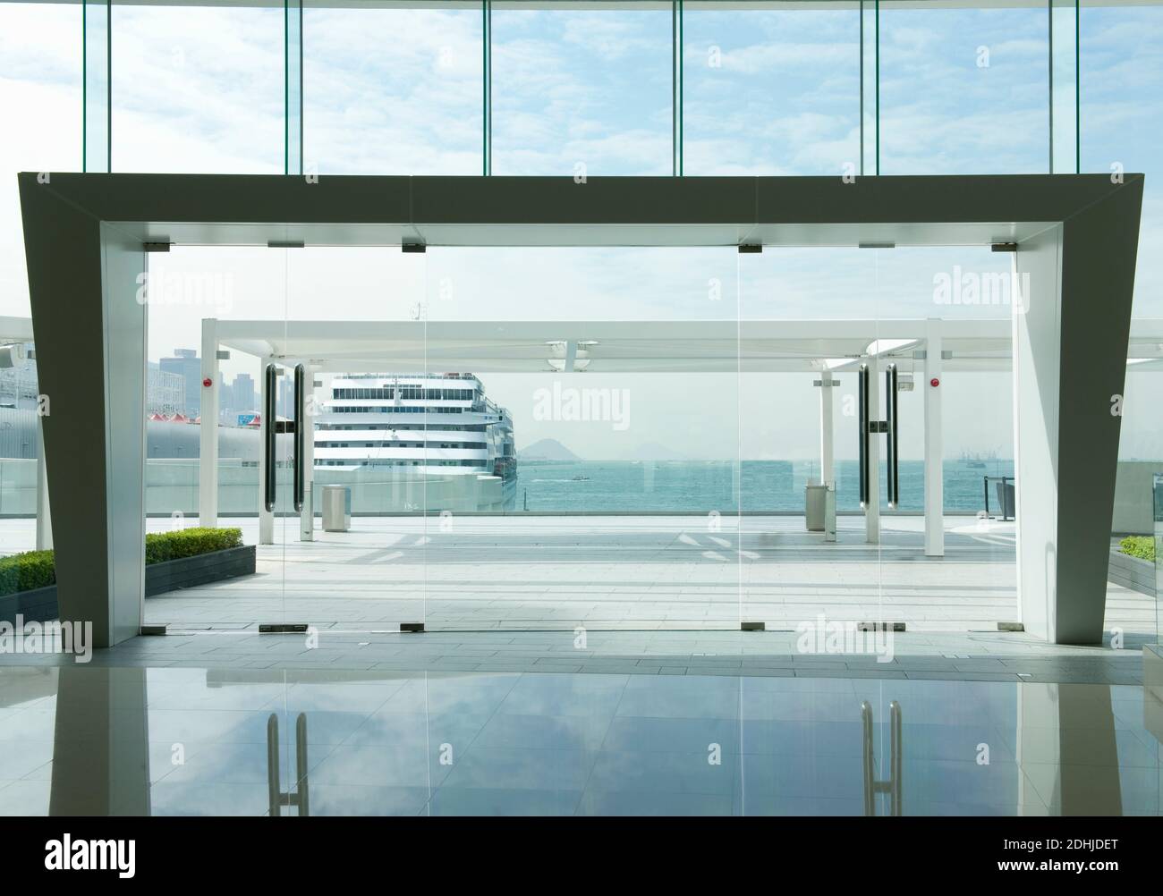 View of cruise shi from inside cruise terminal building Stock Photo - Alamy