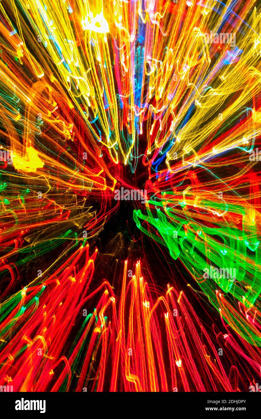 Abstract light trails on dark background Stock Photo - Alamy