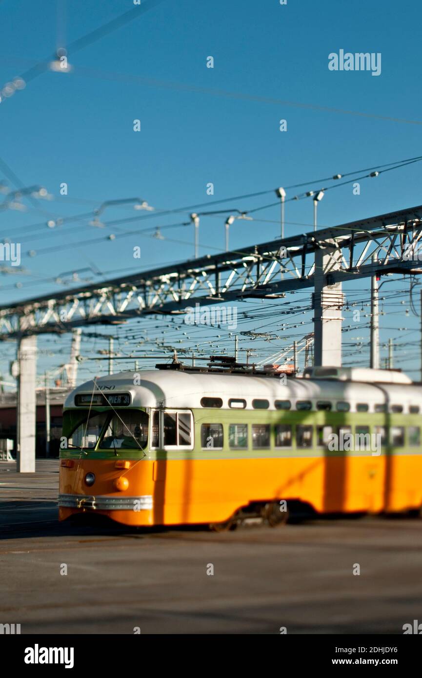 Tram with power lines above Stock Photo - Alamy