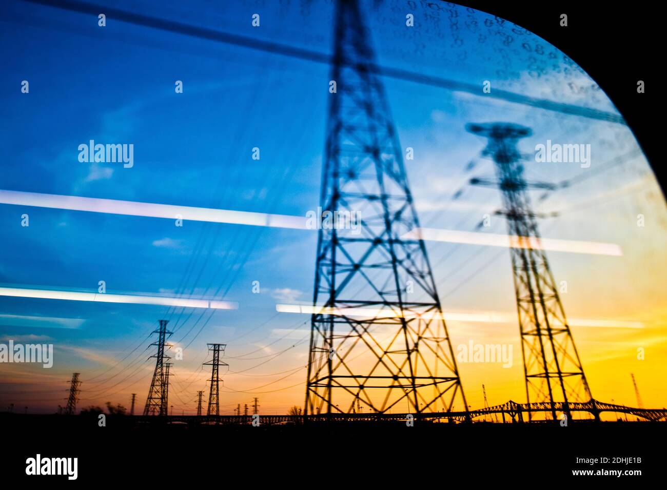 Power lines seen through car window Stock Photo - Alamy
