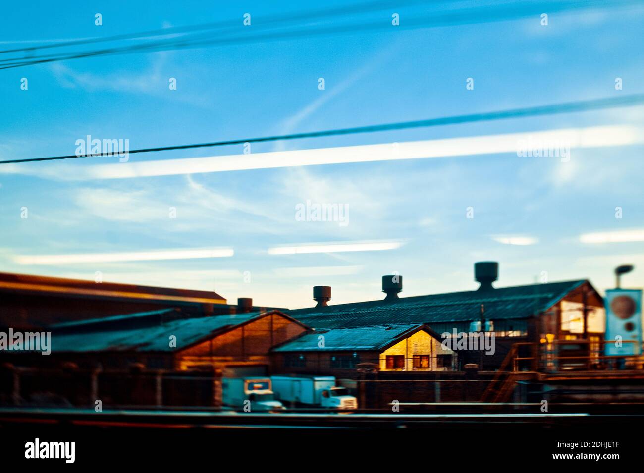 Freight railway station with trucks Stock Photo - Alamy