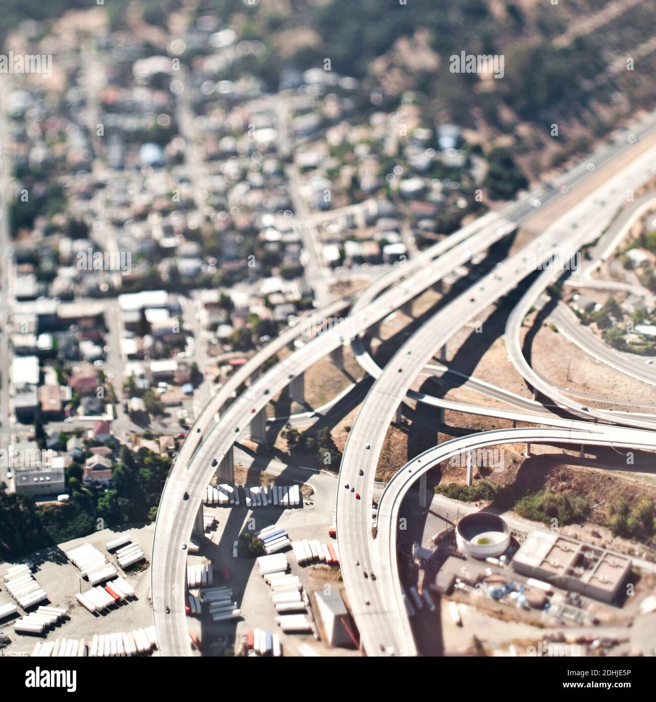 Raised highway above urban sprawl Stock Photo - Alamy