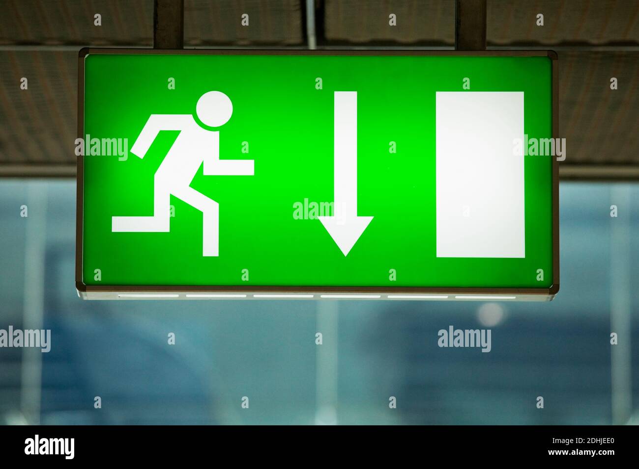Green lit emergency exit sign hi-res stock photography and images - Alamy