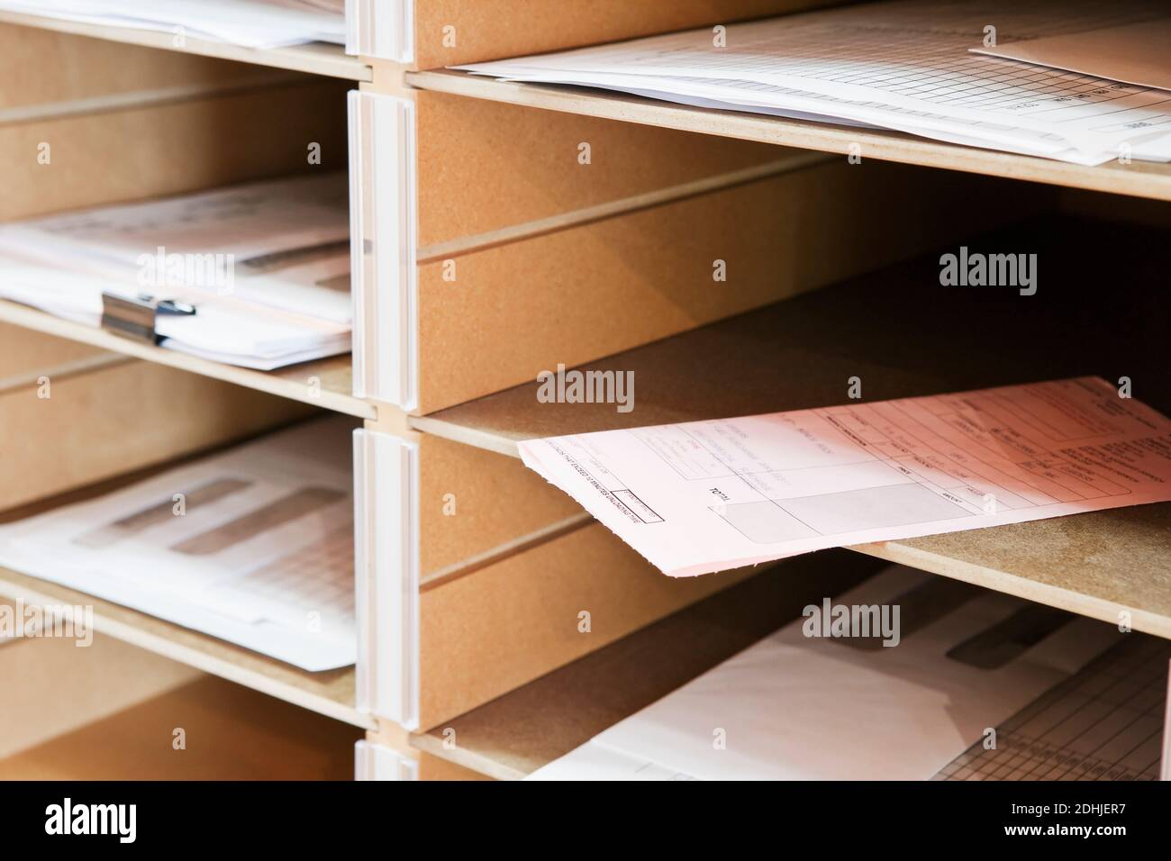 Papers in pigeon holes Stock Photo - Alamy