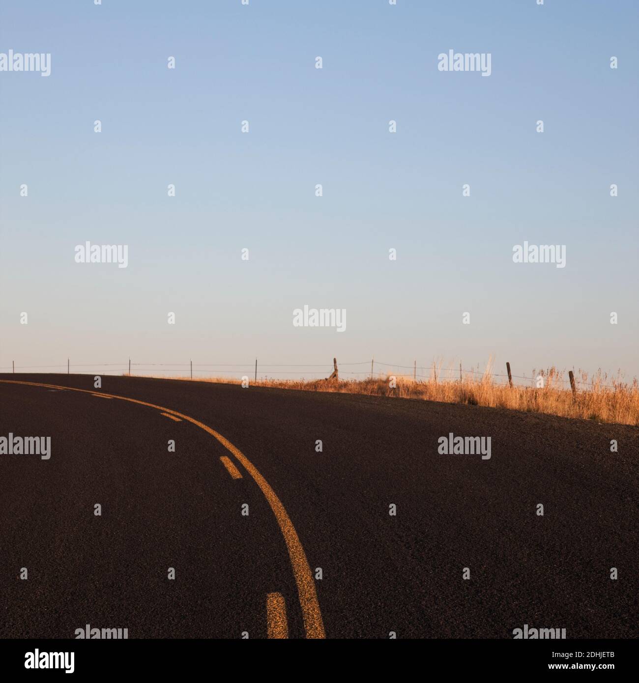 Rural highway curving Stock Photo - Alamy