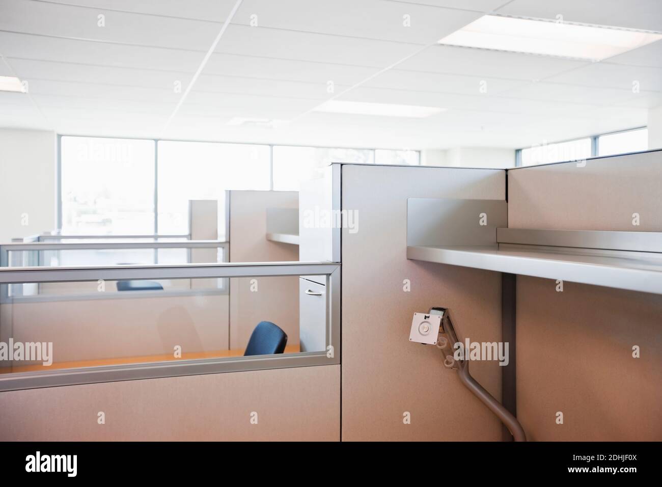 Office cubicles and chairs Stock Photo - Alamy