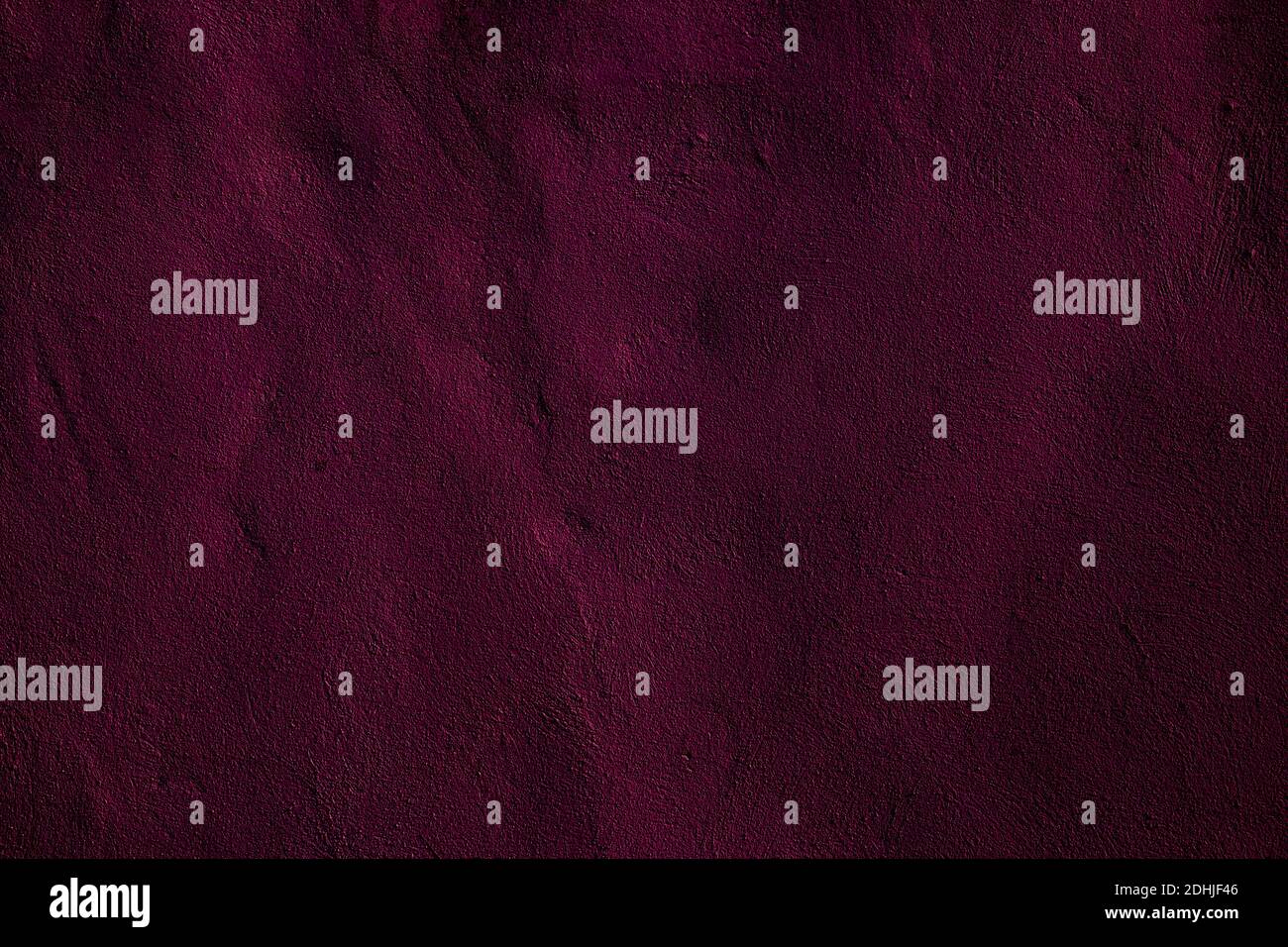Crimson colored wall background with textures of different shades of ...