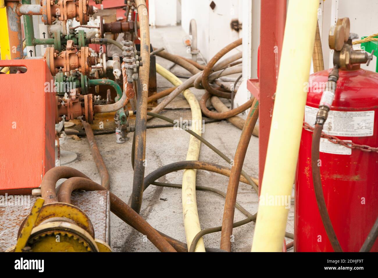 Fire extinguisher and industrial cables Stock Photo - Alamy