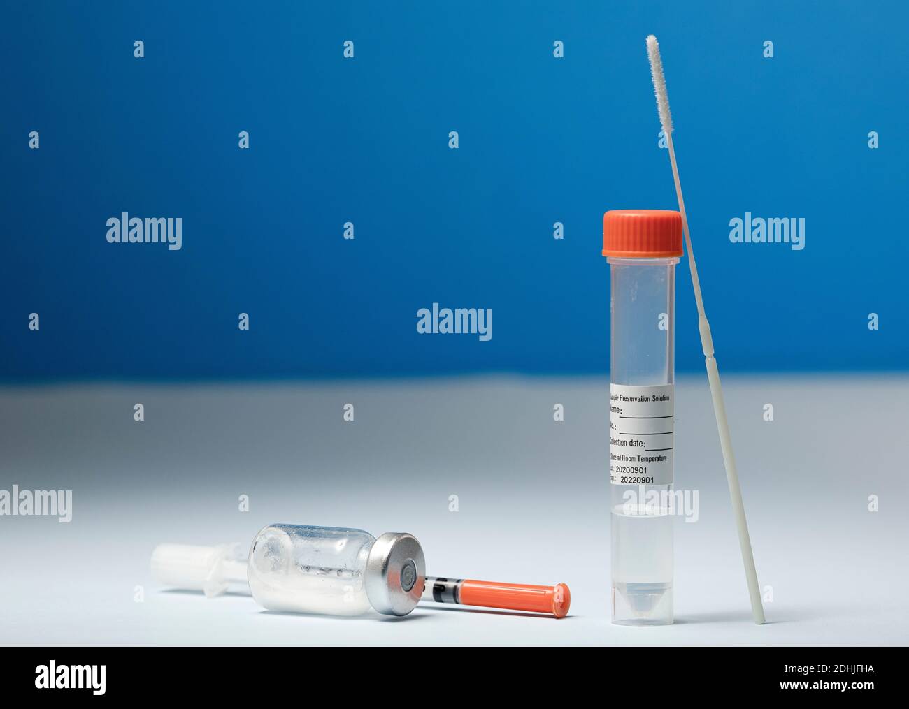 clear vial transport tube with swab, patient data sticker, syringe and ...