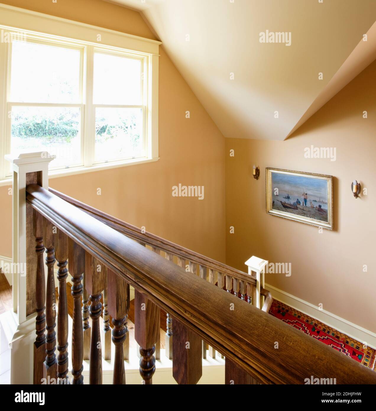 Traditional staircase of house with window and portrait Stock Photo - Alamy