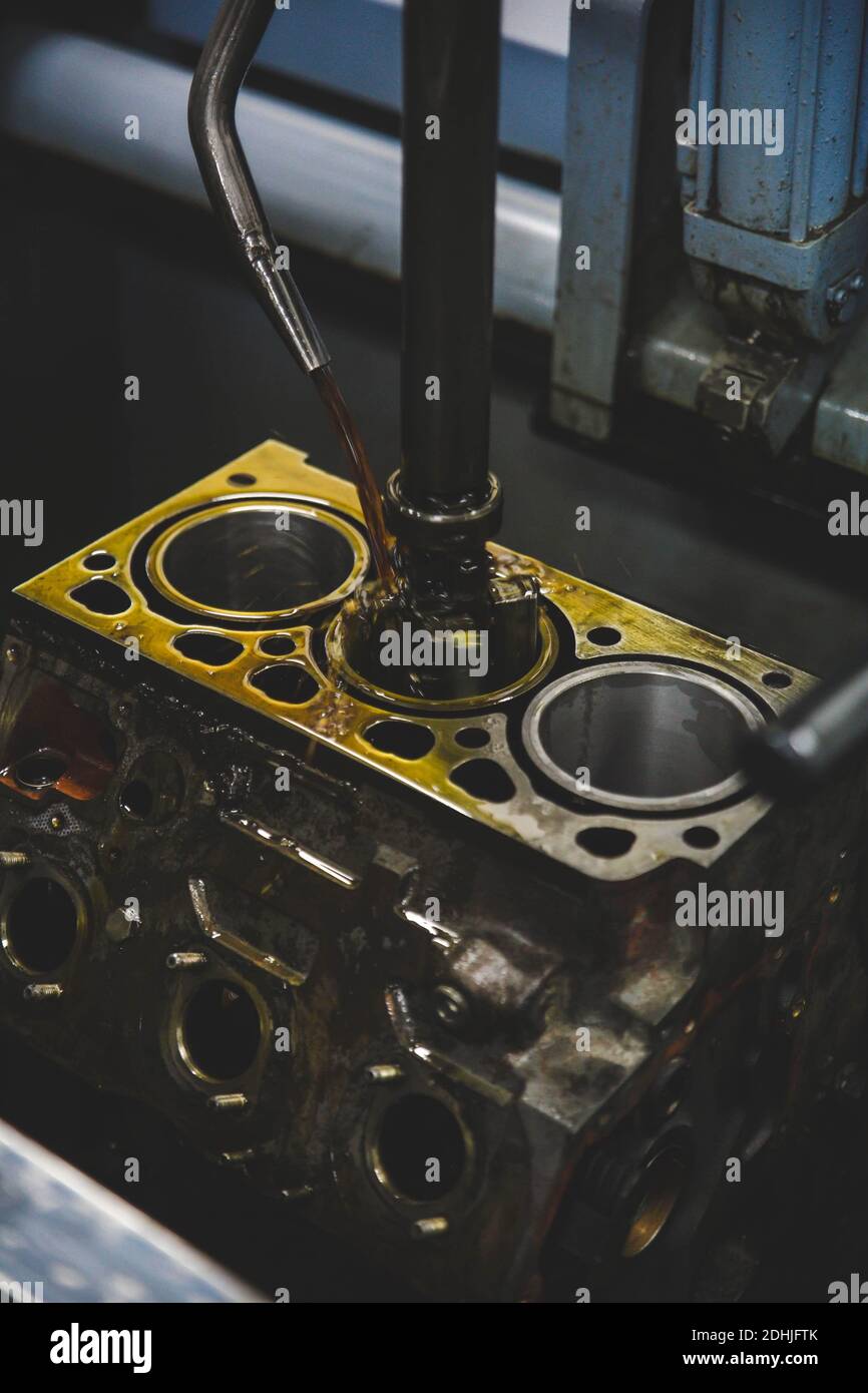 A vertical shot of honing a motor cylinder Stock Photo - Alamy