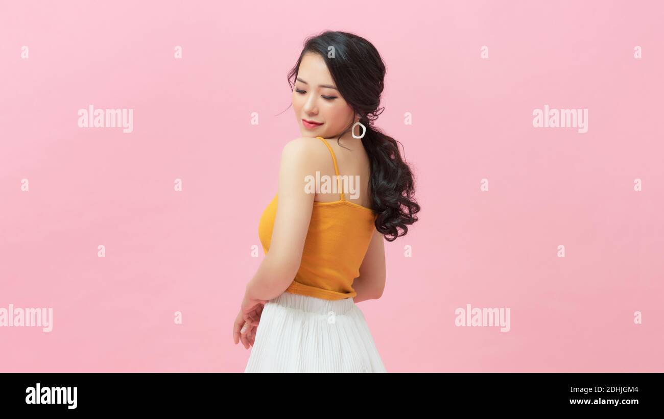happy woman with big smile has turned back Stock Photo - Alamy