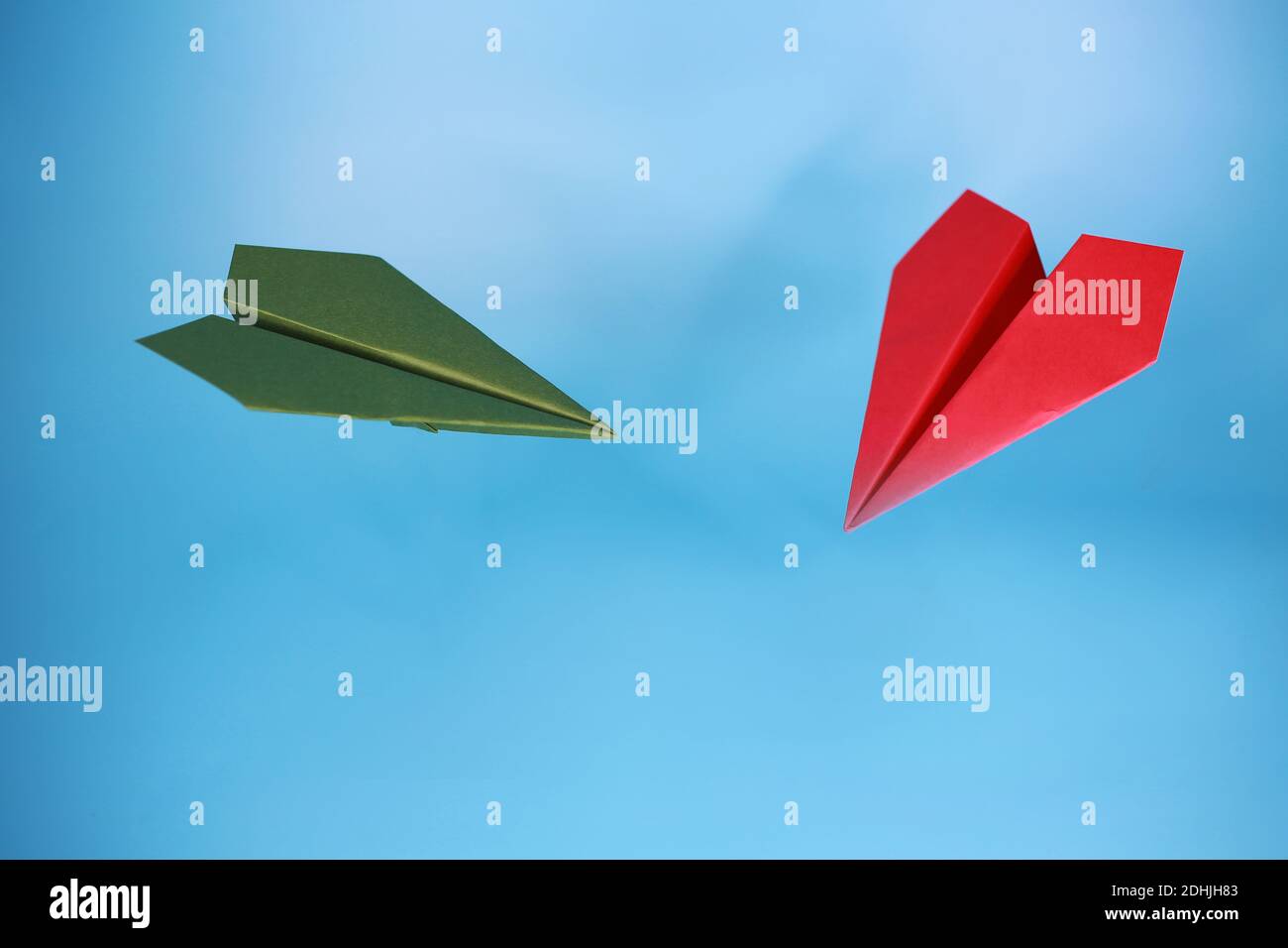 flying paper planes in the mid-air Stock Photo - Alamy