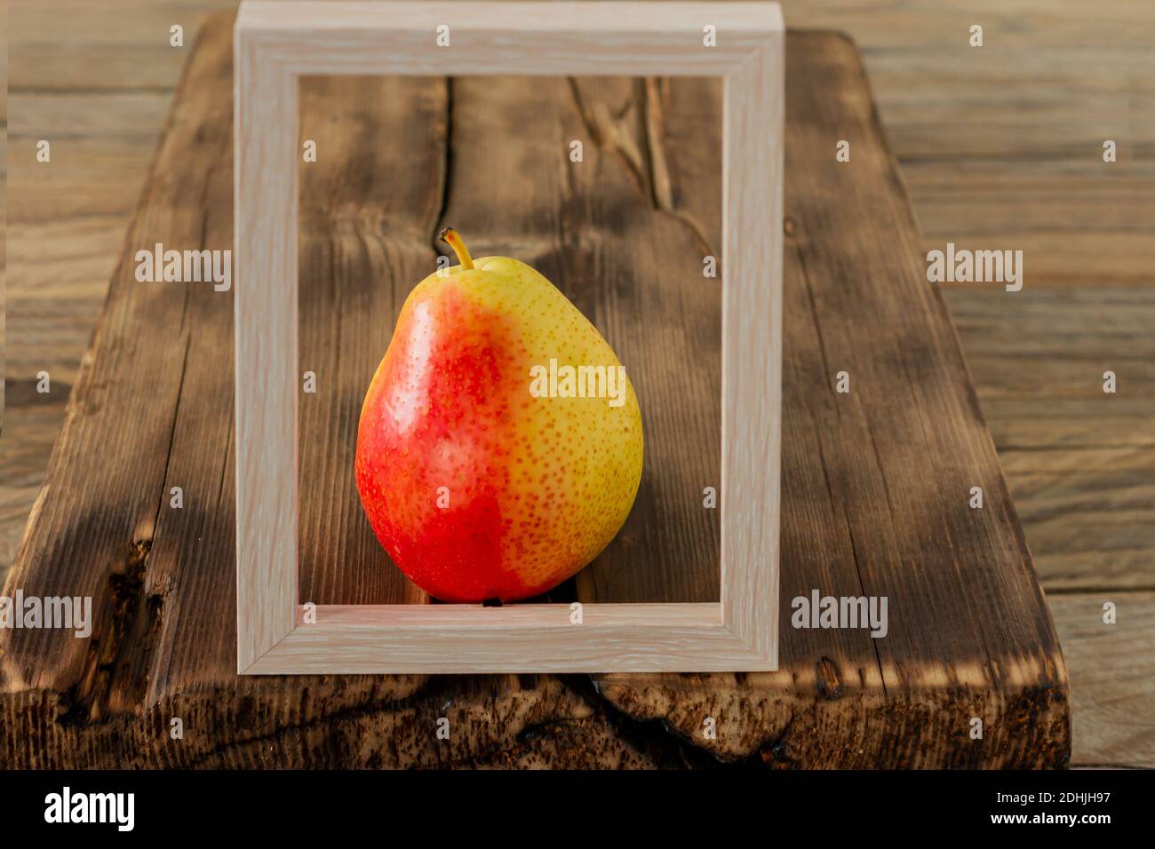fresh Pear portrait in the frame. Food art Stock Photo - Alamy