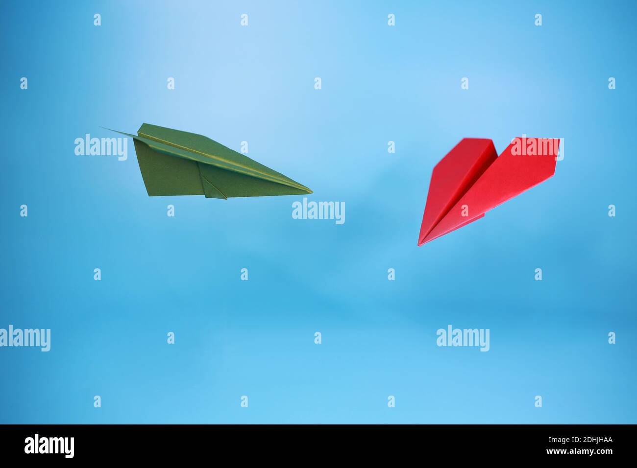 flying paper planes in the mid-air Stock Photo - Alamy