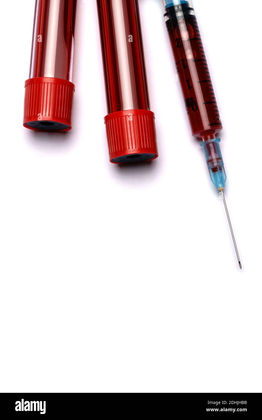 Medical syringe and plastic test tube isolated on white background ...