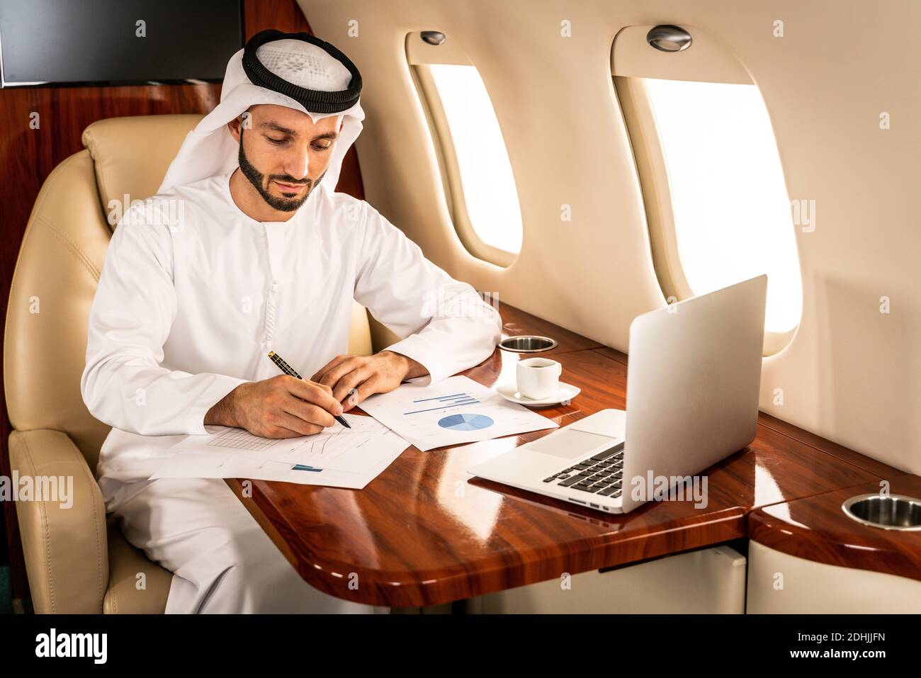 Arabic man wearing kandora in emirates style flying on exclusive ...
