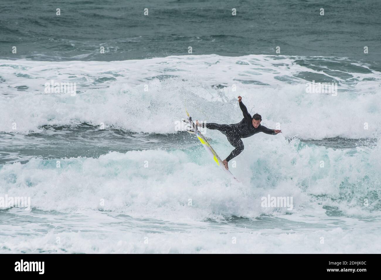 Wild surfing action at Fistral a surfing hotspot in Newquay in Cornwall ...