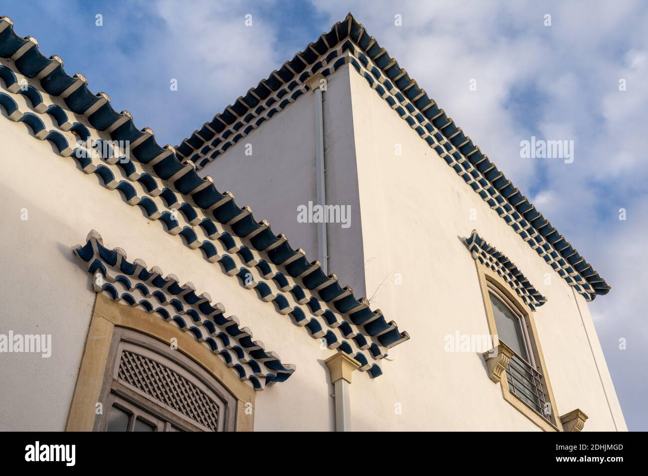 Tomar, Portugal: 8 December 2020: typical white plaster house with blue ...