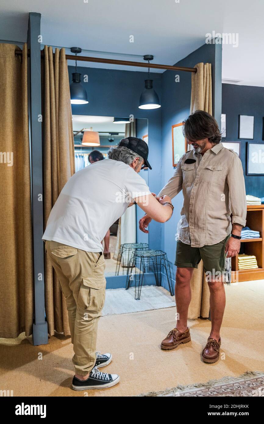 Male shop assistant clothes shop hi-res stock photography and images ...