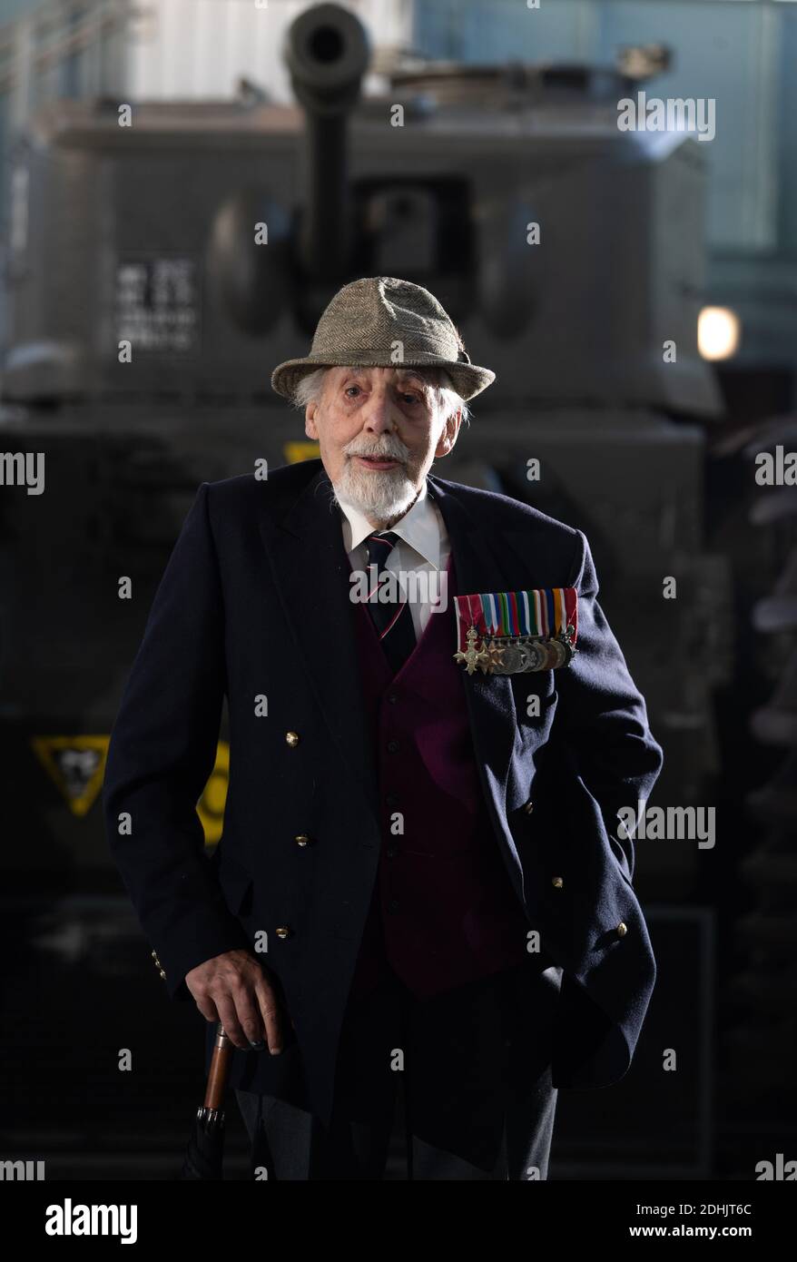 Veteran James Rawe, who served as a crewman on LCT 1051, poses for a ...