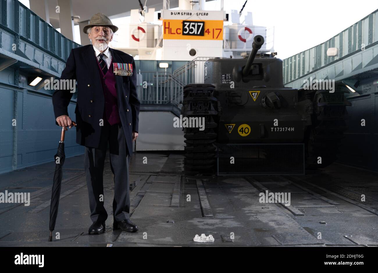 Veteran James Rawe, who served as a crewman on LCT 1051, poses for a ...
