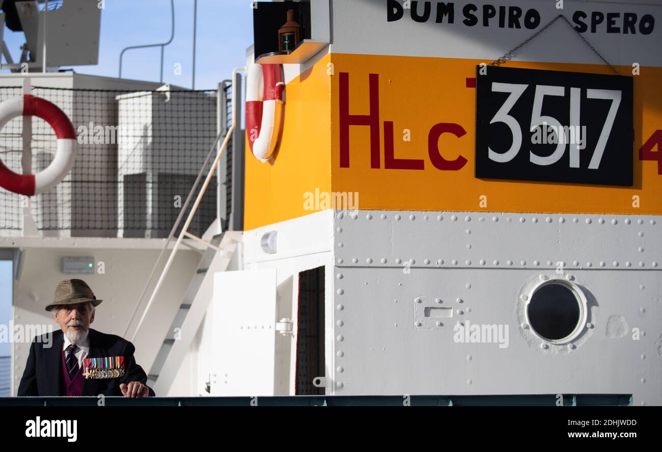 Veteran James Rawe, who served as a crewman on LCT 1051, poses for a ...