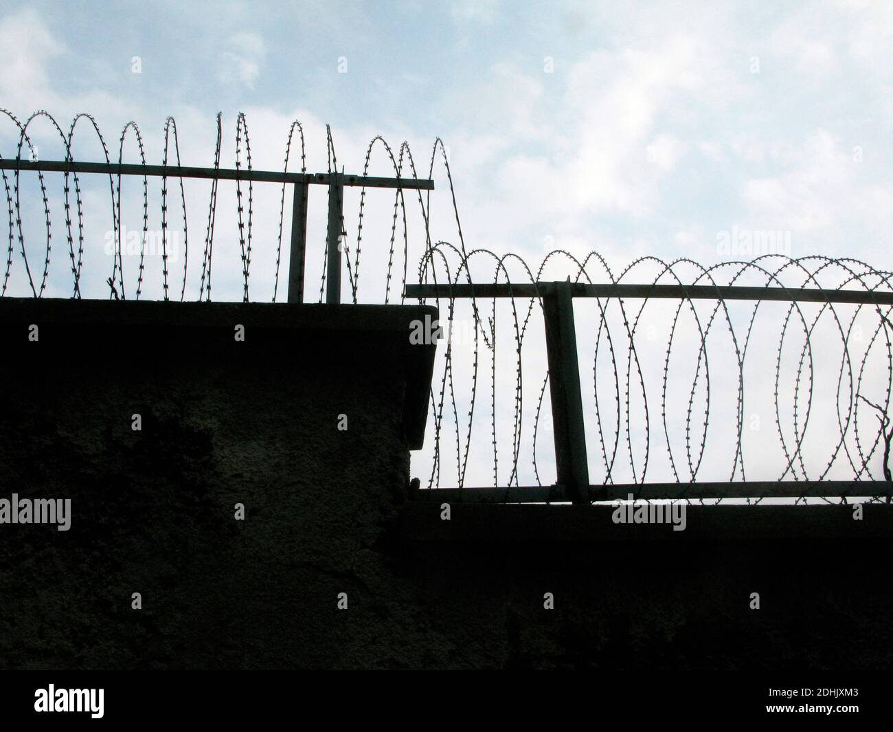barbed wire as barrier in a prison, measure to prevent outbreaks Stock ...