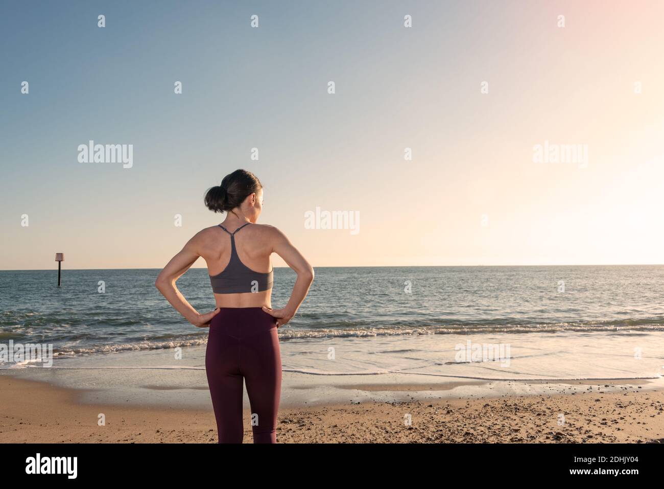 Back view fitness woman slim hi-res stock photography and images - Alamy