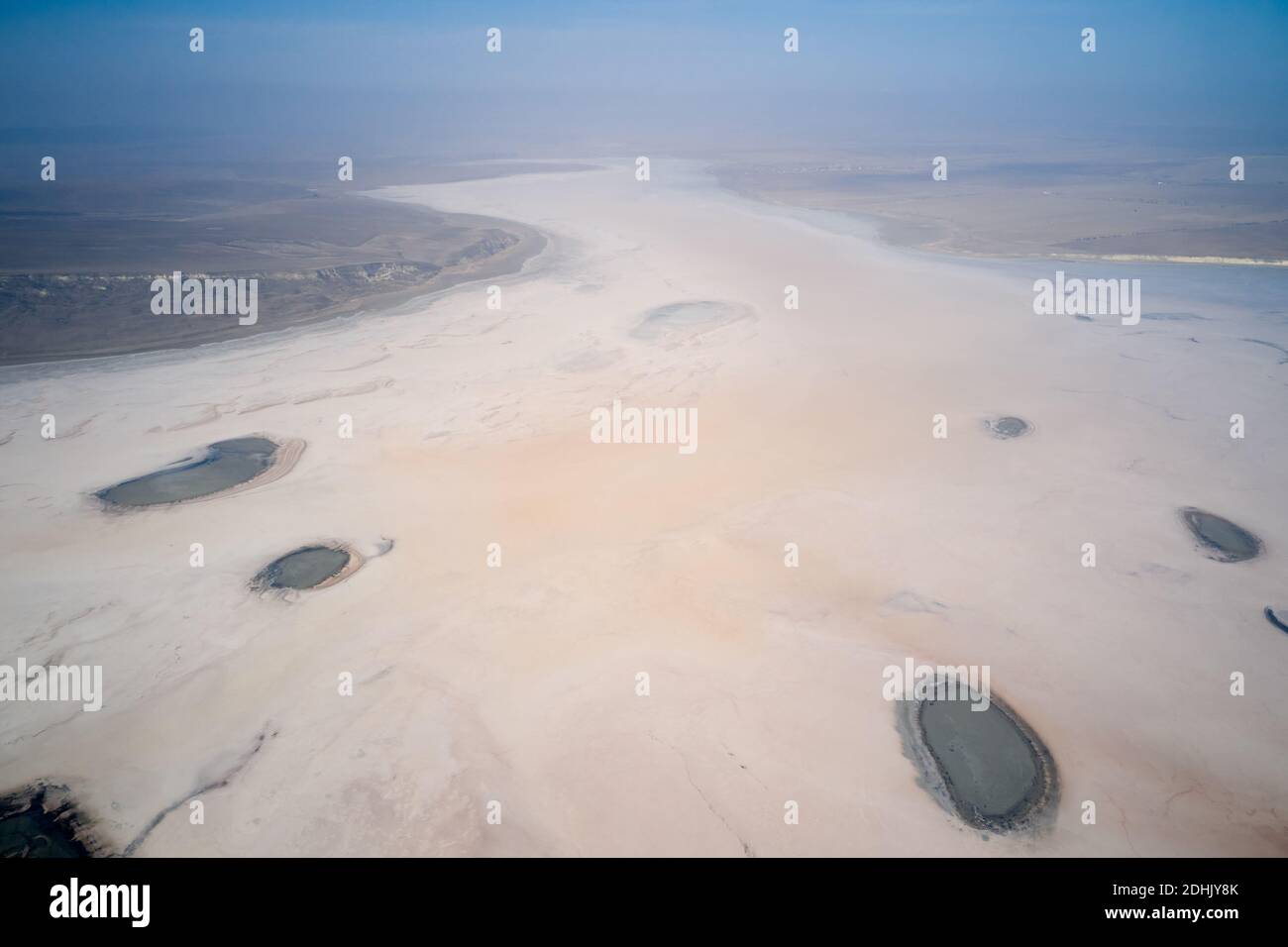 Amazing drone view from above of blue sea water washing rocky shore ...