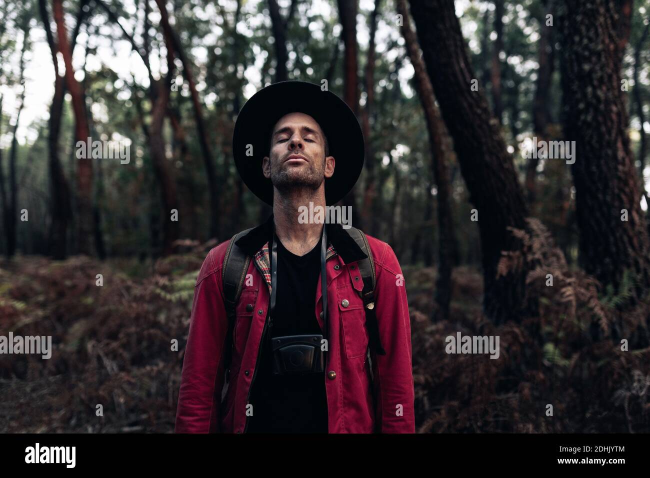 Full body back view of anonymous male lifeguard in shorts and t shirt ...