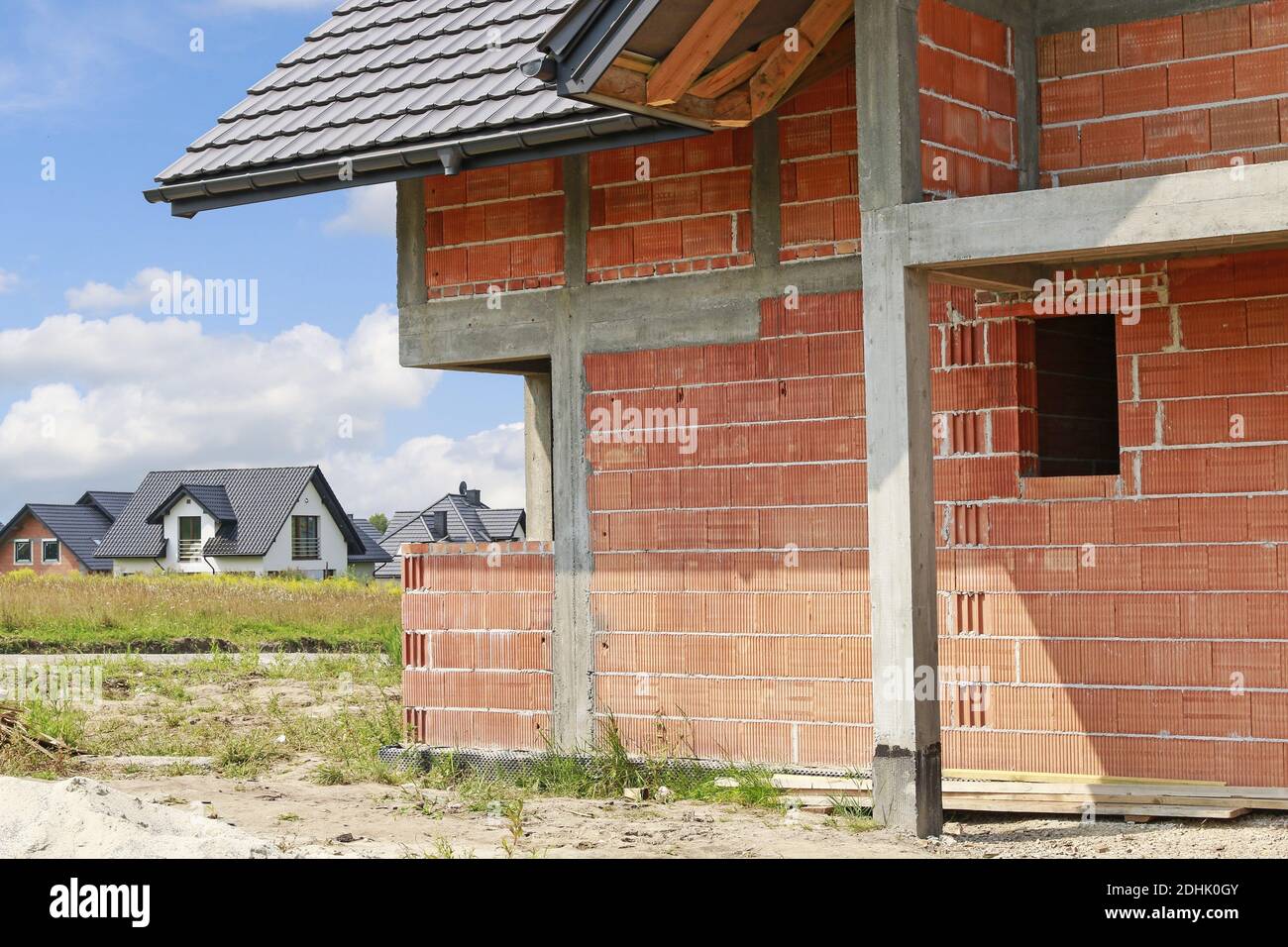 Construction site of a detached house. Suburb place Stock Photo - Alamy